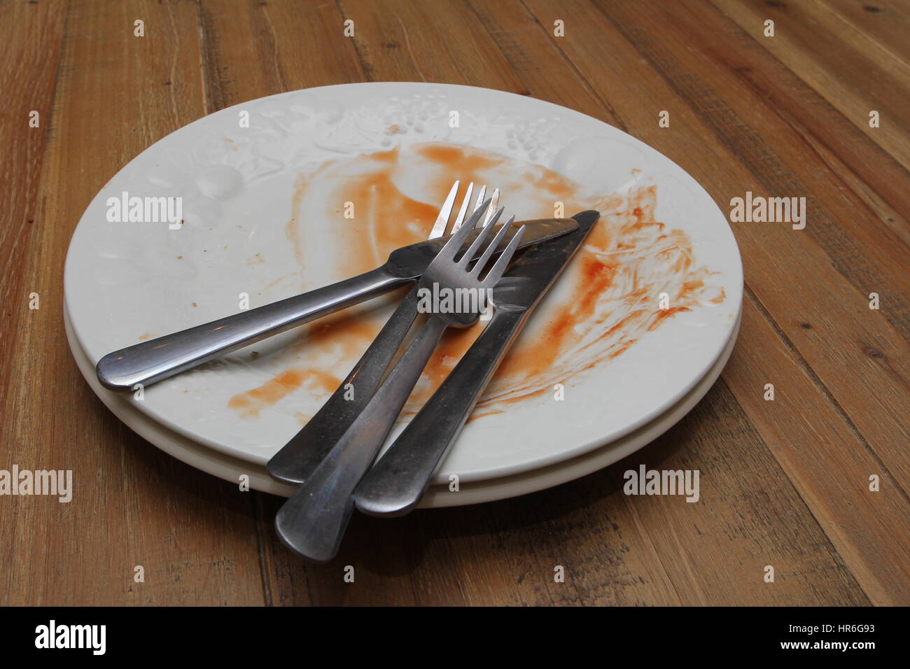 Dirty dinner plates -Fotos und -Bildmaterial in hoher Auflösung – Alamy