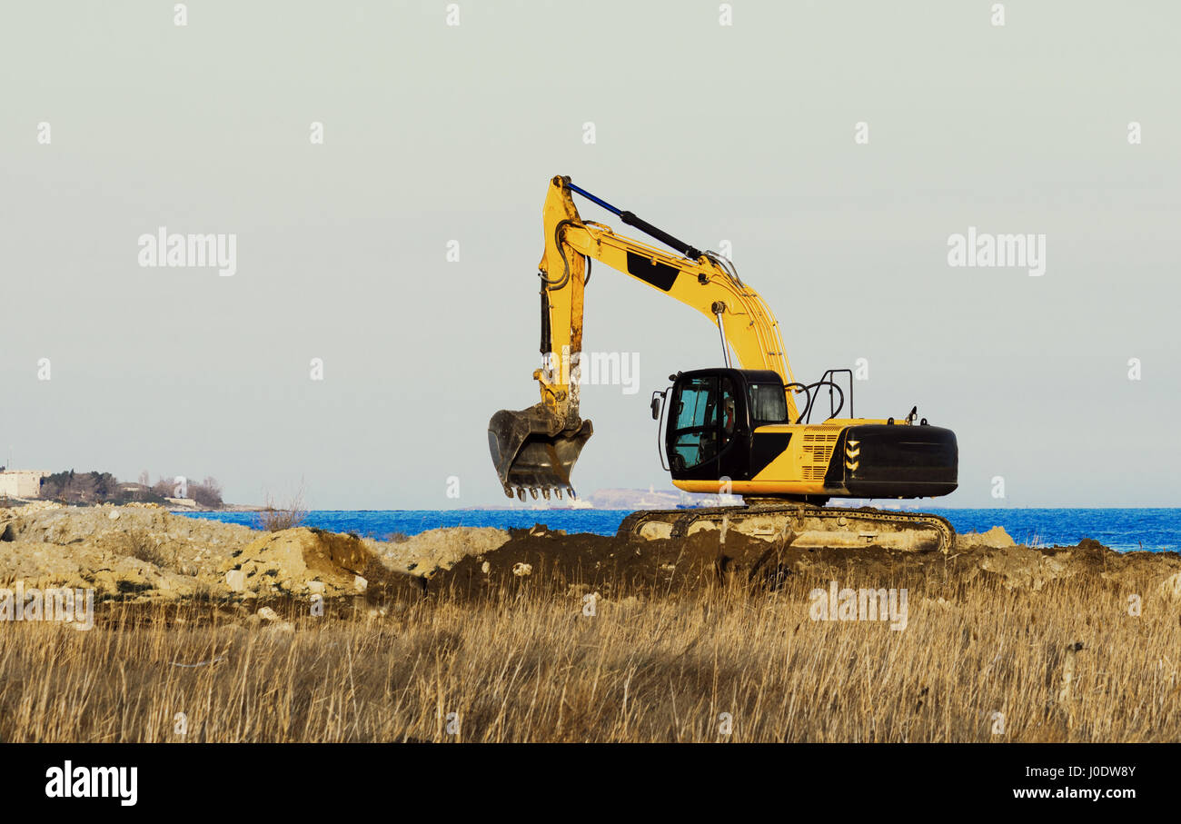 Einen bagger reinigen -Fotos und -Bildmaterial in hoher Auflösung – Alamy