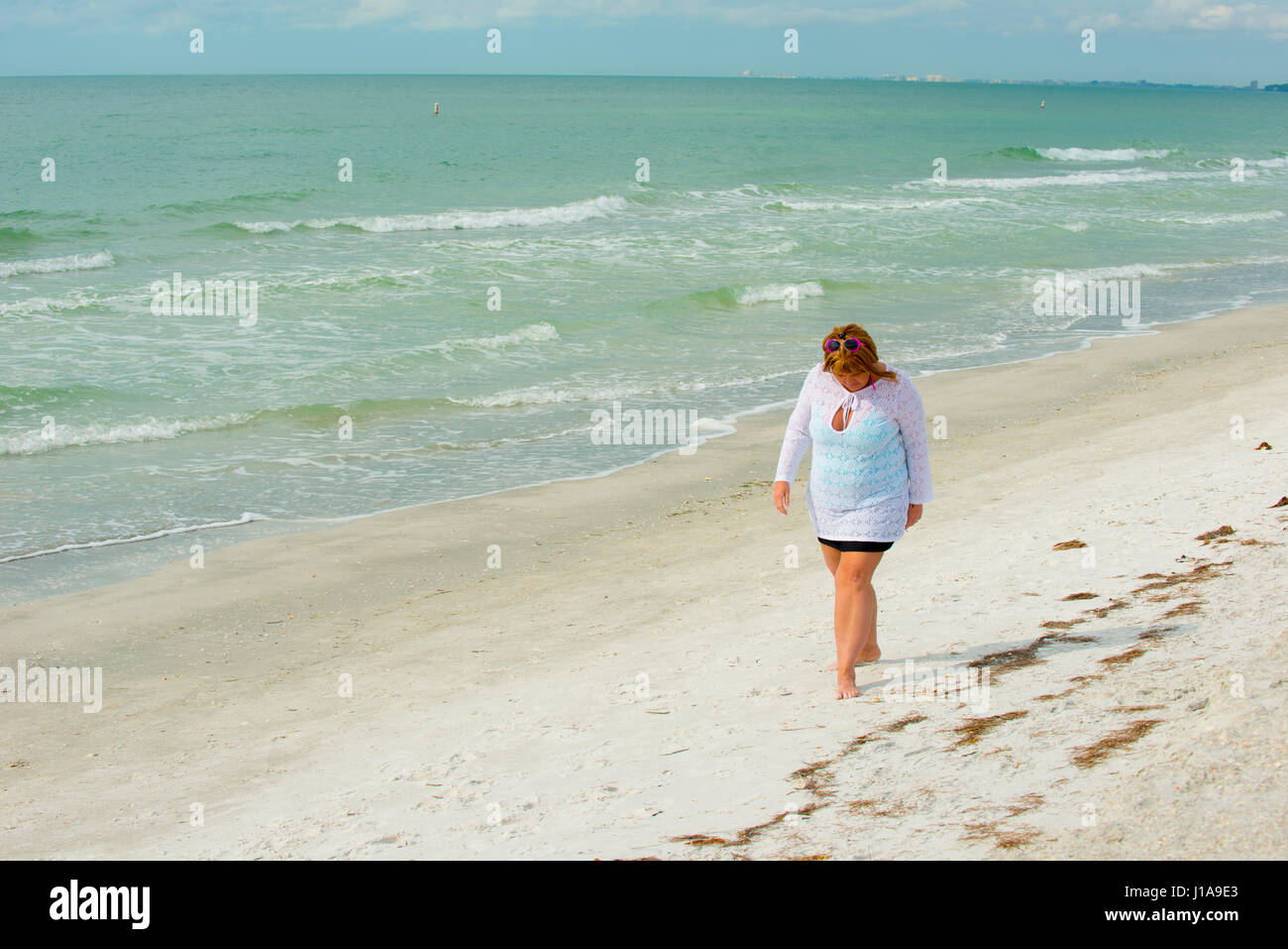 Strand mit wenigen menschen -Fotos und -Bildmaterial in hoher Auflösung ...