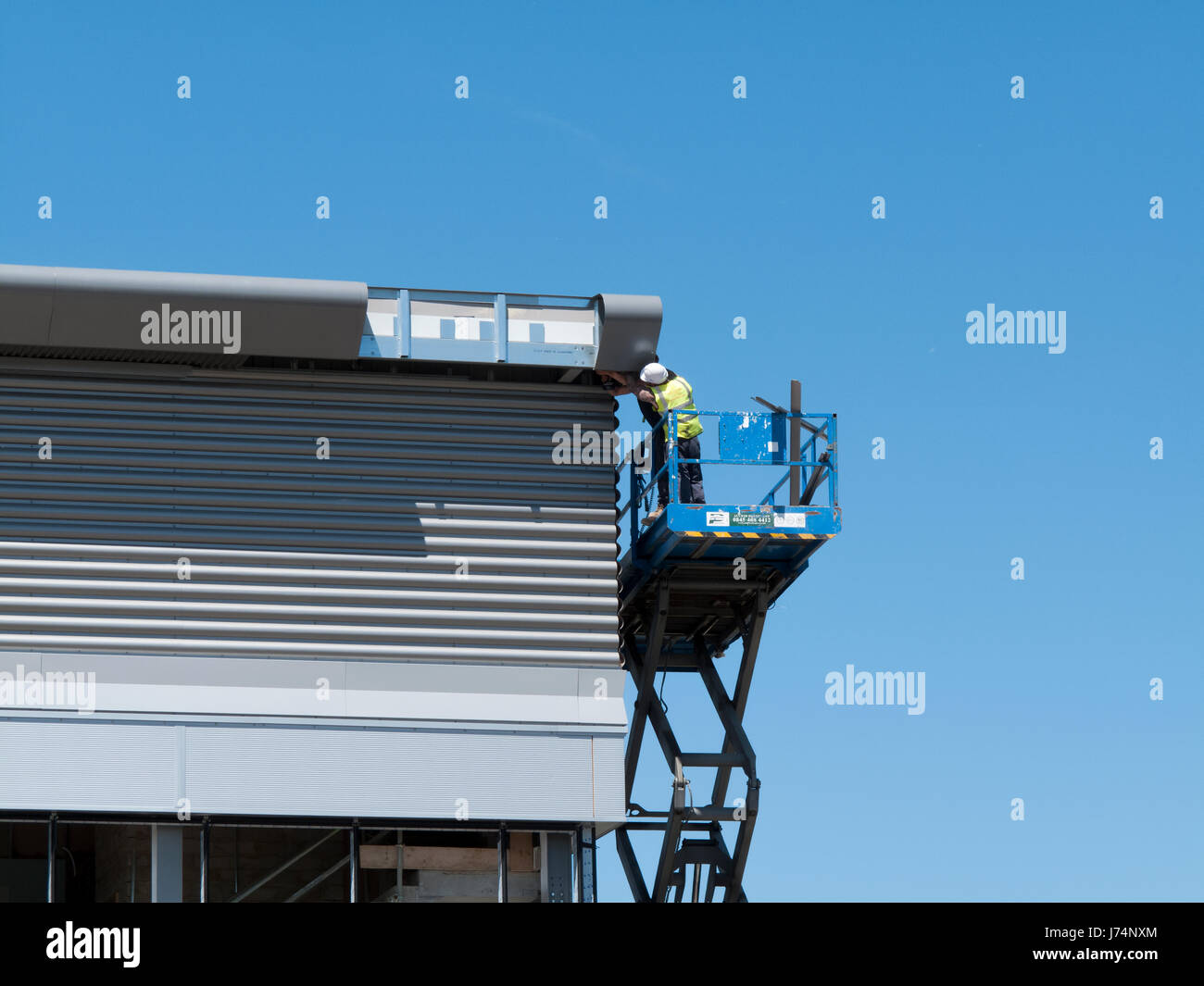 Mobile schere -Fotos und -Bildmaterial in hoher Auflösung – Alamy