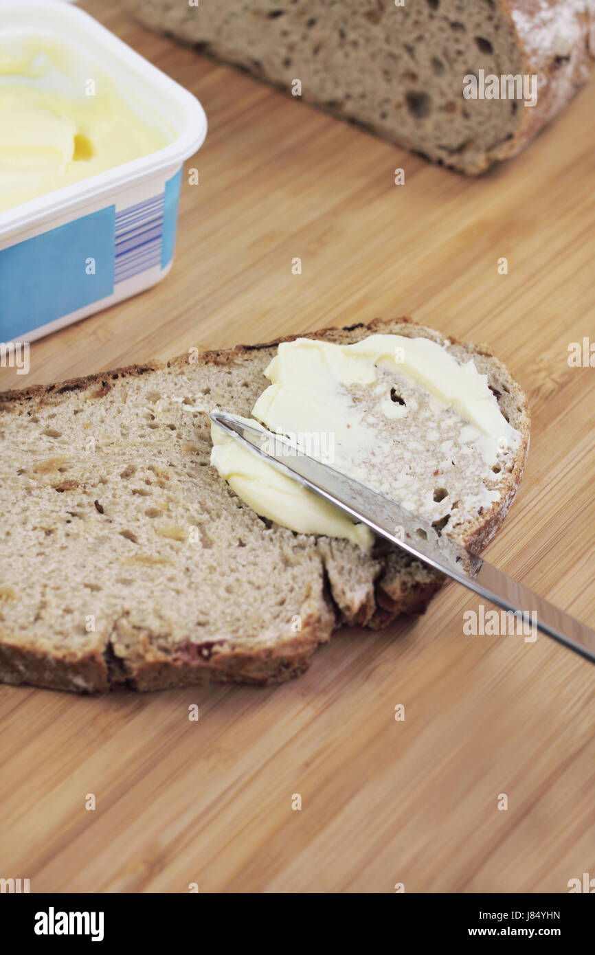 Lebensmittel Nahrungsmittel Brot brechen Margarine Bread & Butter Arm ...