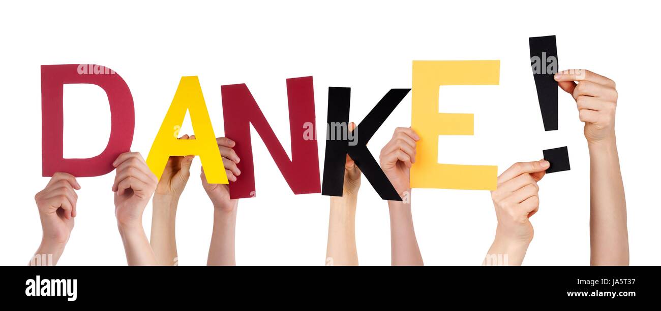 Viele Hände halten das deutsche Wort Danke, das was dank in den Farben ...