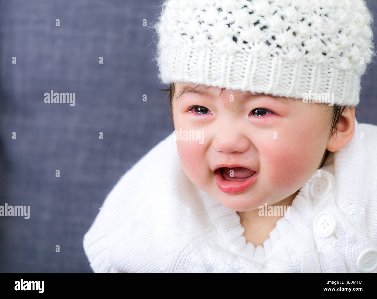 Baby pout cry -Fotos und -Bildmaterial in hoher Auflösung – Alamy
