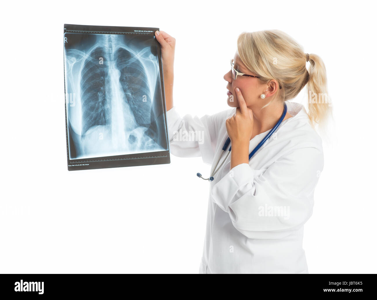 Arzt mit Röntgenbild Stockfotografie - Alamy