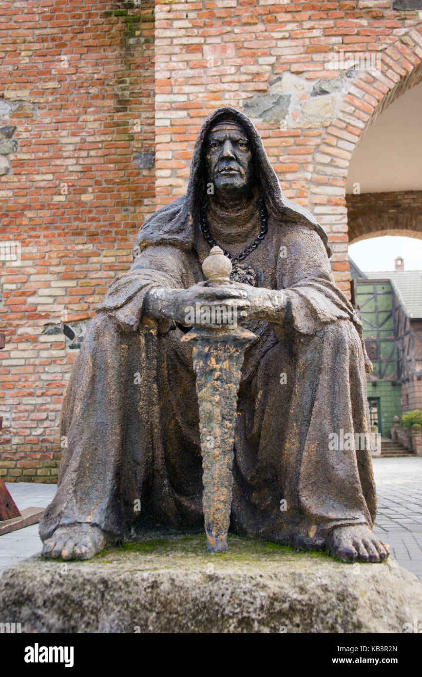 Statue eines Scharfrichters Sitzend mit seiner Waffe in eine ...