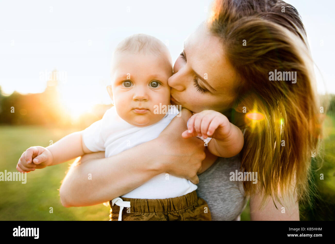 Young mother preparing holding baby -Fotos und -Bildmaterial in hoher ...