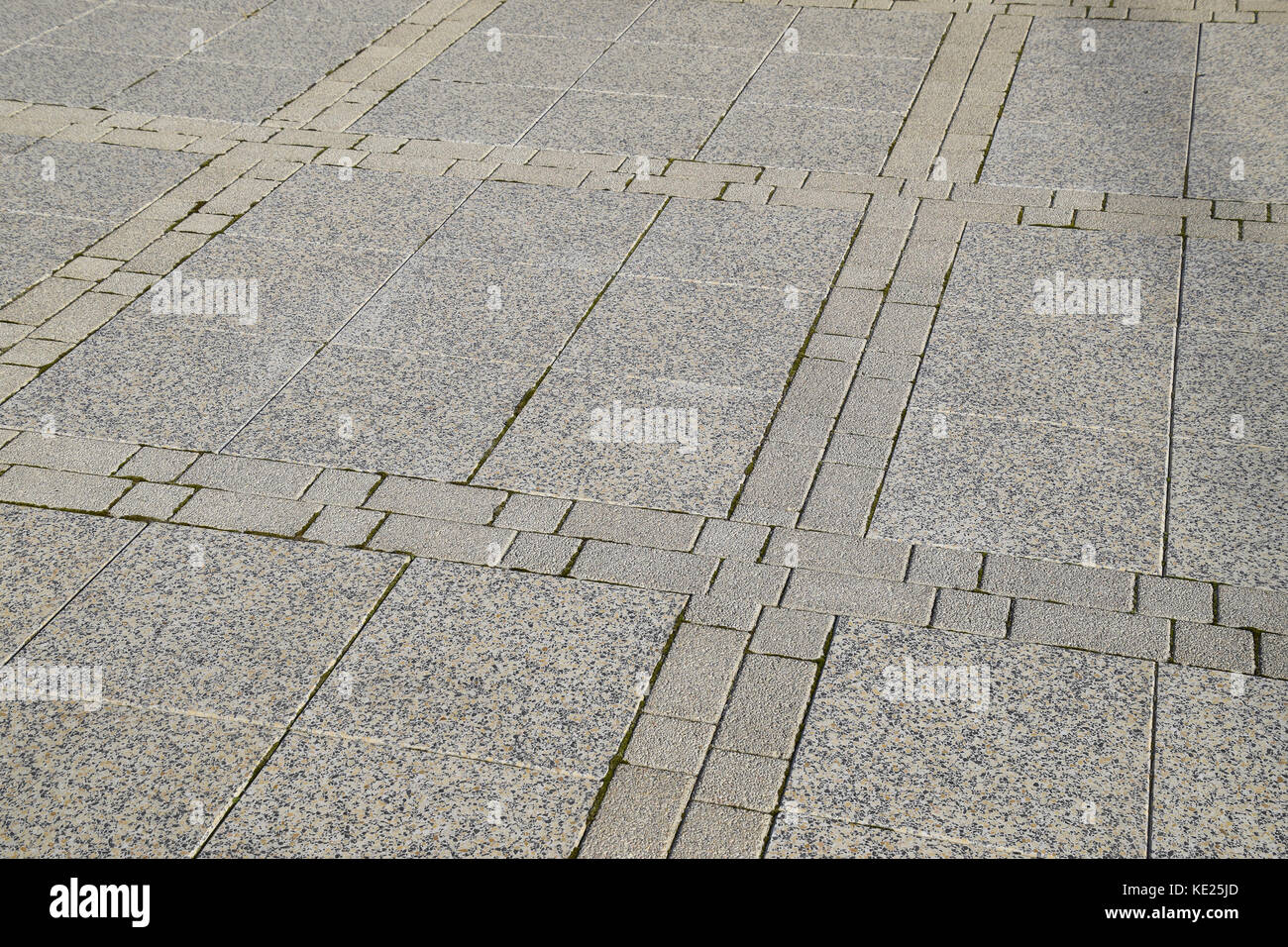 Abbildung aus der Pflastersteine auf dem Platz. Hintergrund der ...