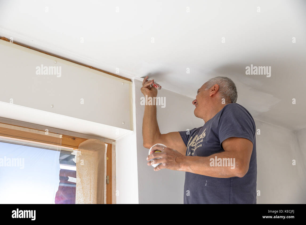 Plastering man -Fotos und -Bildmaterial in hoher Auflösung – Alamy