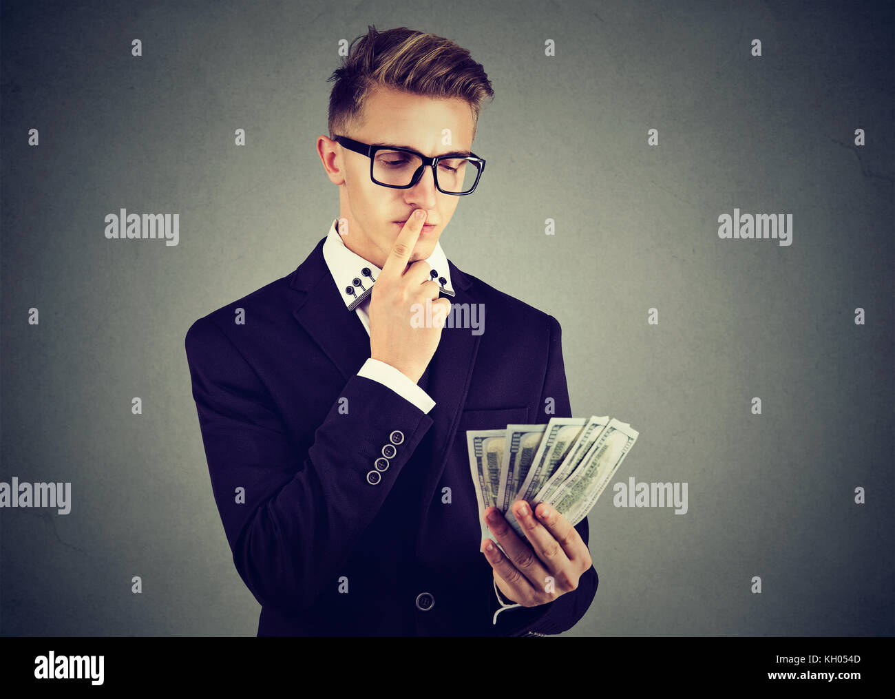 Geld gier man -Fotos und -Bildmaterial in hoher Auflösung – Alamy