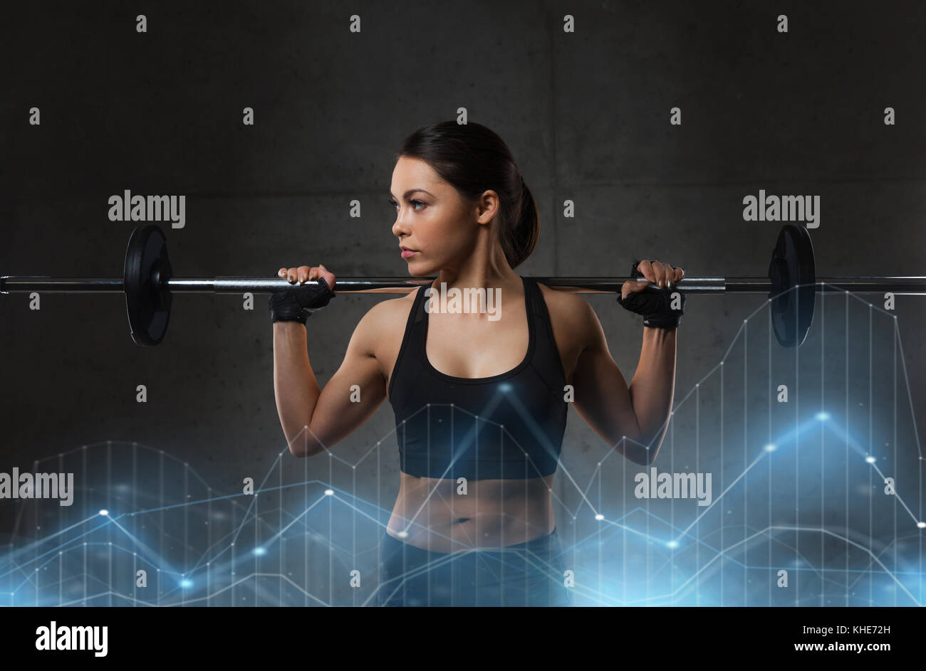 Female bodybuilder flexing biceps -Fotos und -Bildmaterial in hoher ...