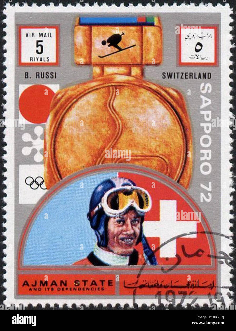 1972 Briefmarke von Ajman Bernhard Russi Stockfotografie - Alamy