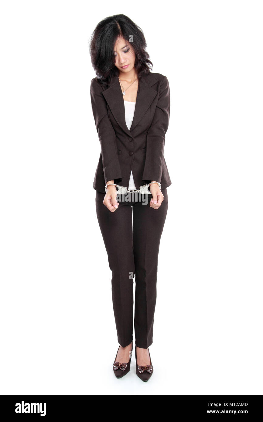 Young Business Frau in Handschellen isoliert auf weißem Stockfotografie ...