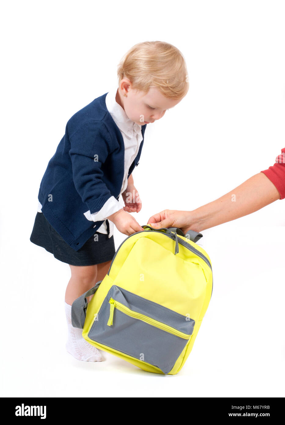 Happy kleines Schulmädchen. Kind mit Rucksack und Bücher. Vorschule zur ...