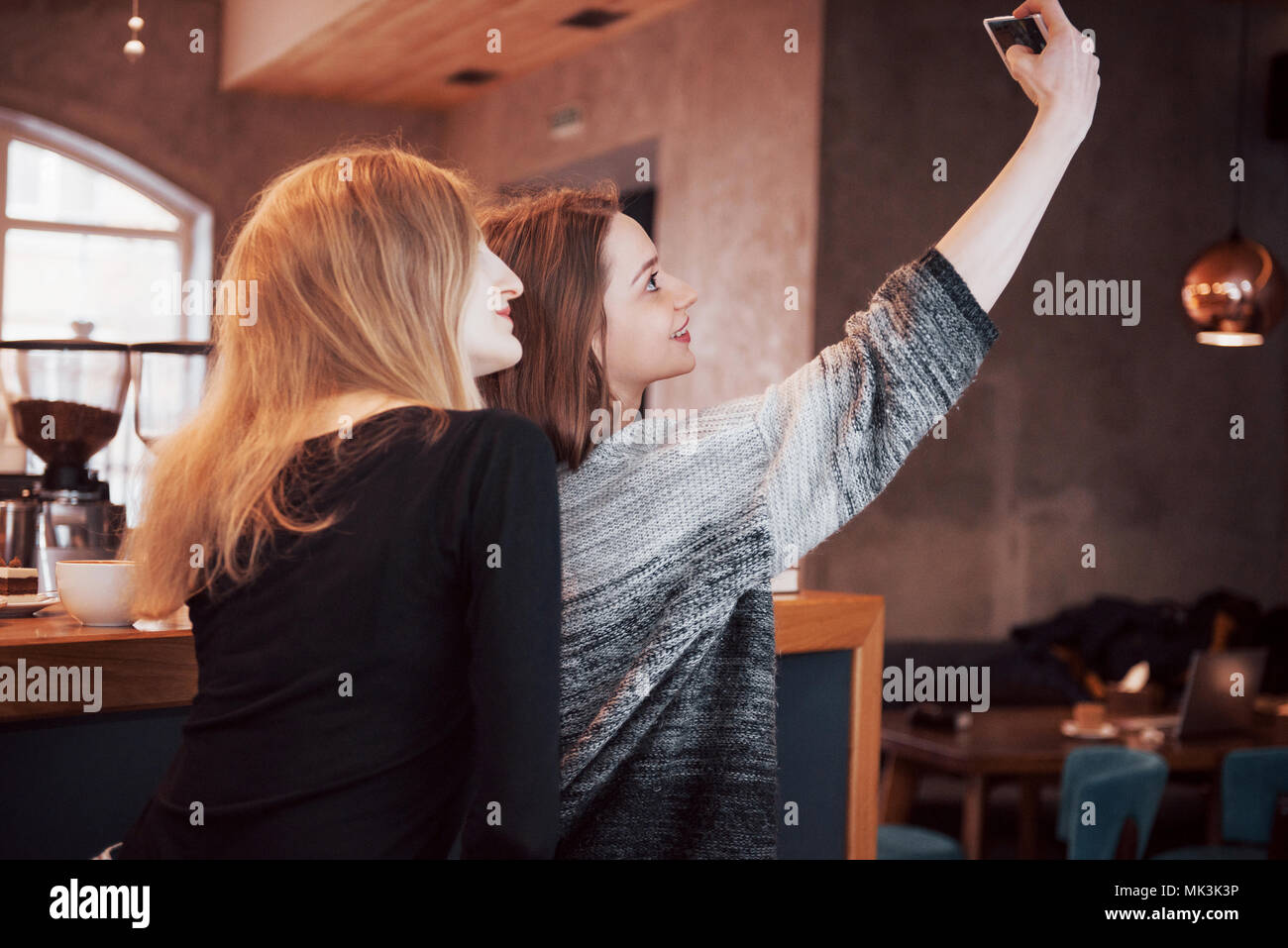 Two Friends Drinking Coffee Stockfotos & Two Friends Drinking Coffee ...