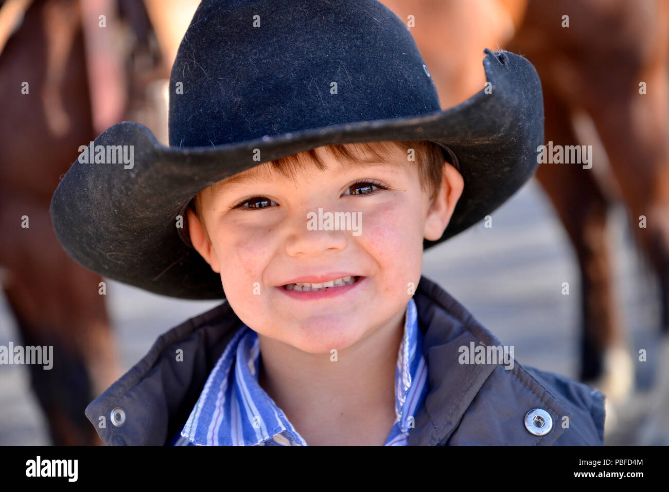 Smiling cowboy -Fotos und -Bildmaterial in hoher Auflösung – Alamy
