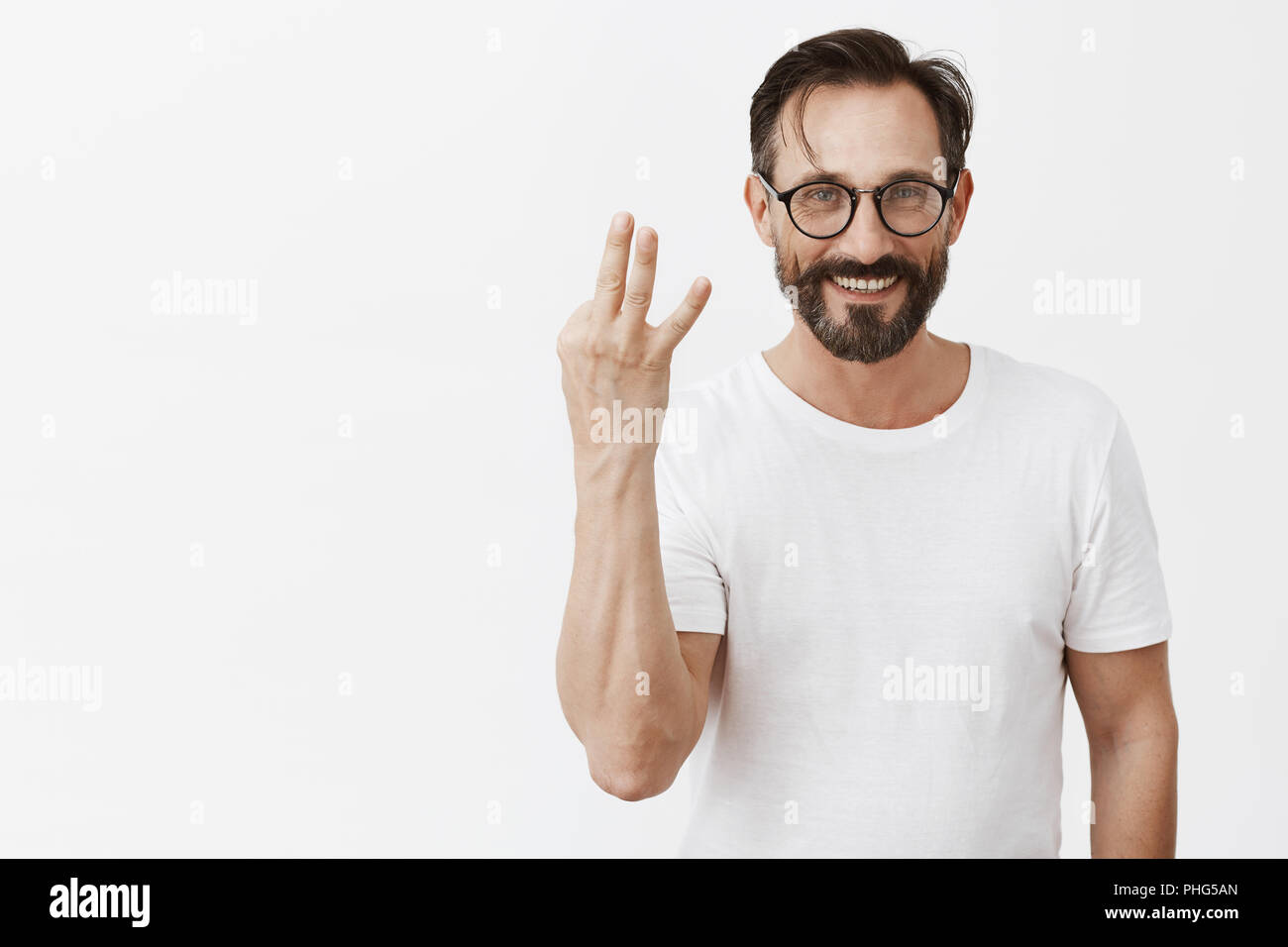 Männliches model mit brille -Fotos und -Bildmaterial in hoher Auflösung ...