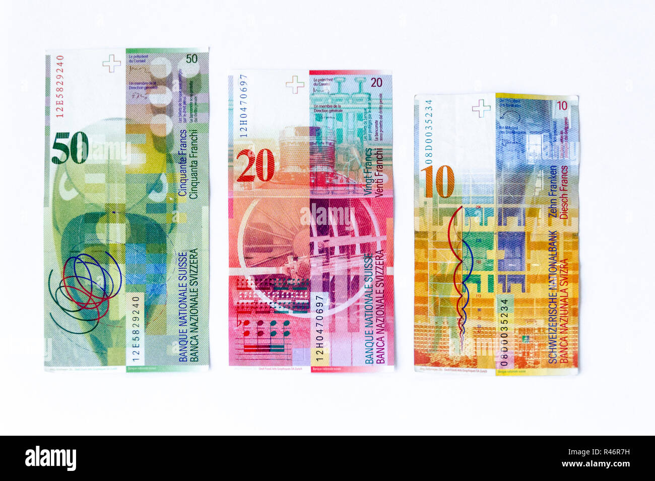 Schweizer Franken auf weißem Hintergrund Stockfotografie - Alamy