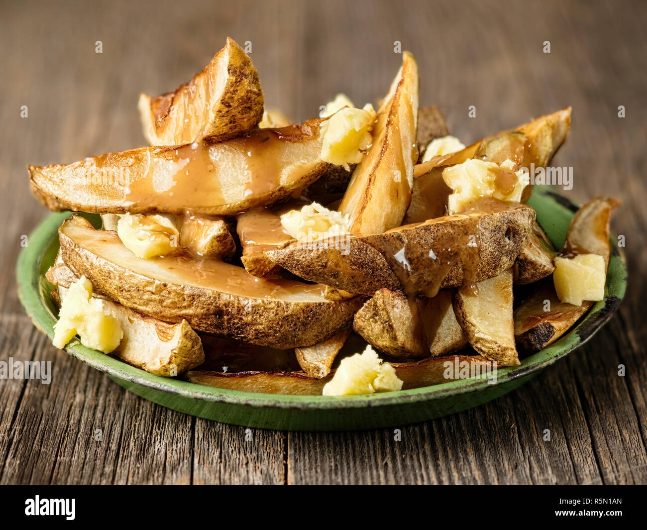 Quebecois poutine -Fotos und -Bildmaterial in hoher Auflösung – Alamy