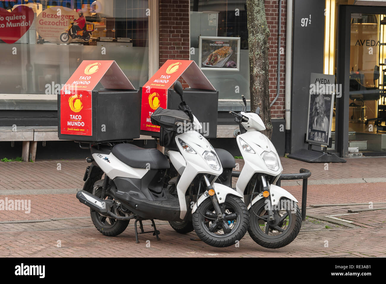 Pizza lieferroller -Fotos und -Bildmaterial in hoher Auflösung – Alamy