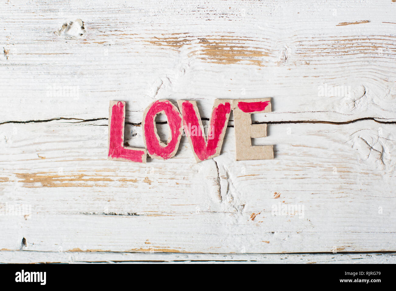 Liebe Symbole Hand in Aquarell auf weiße Holztisch lackiert ...