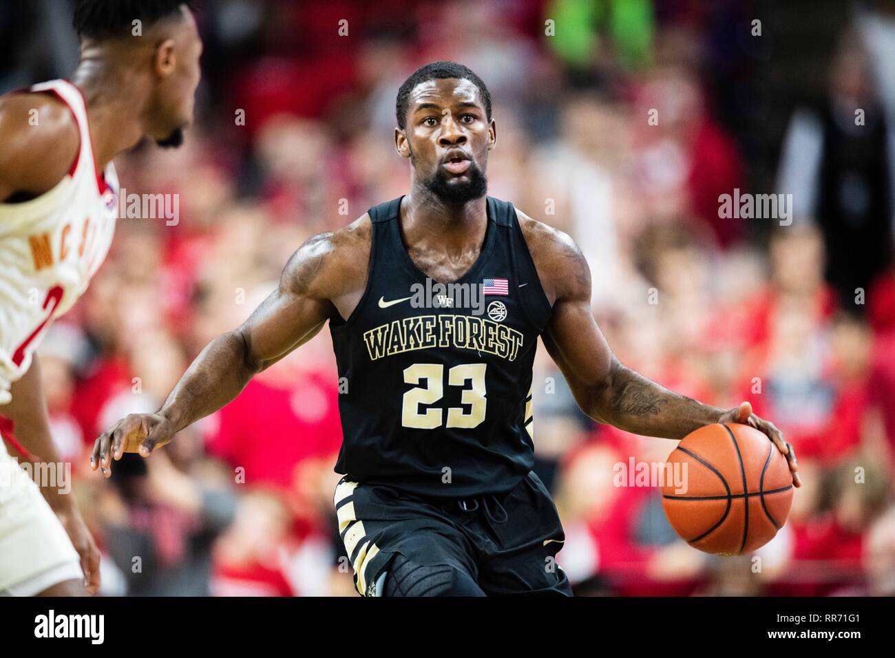 Raliegh, North Carolina, USA. 24 Feb, 2019. Wake Forest Dämon-diakone guard Chaundee Braun (23 ...