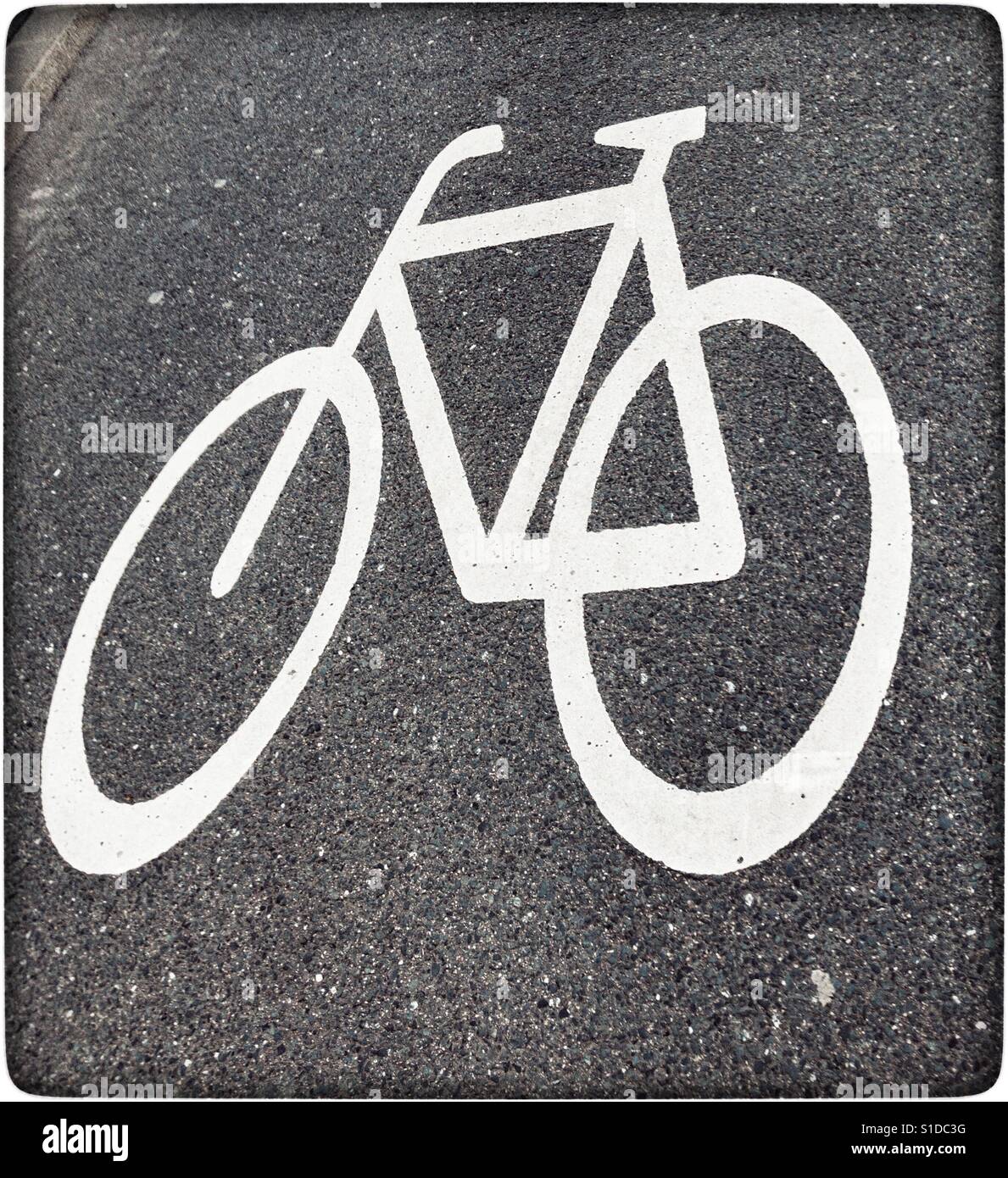 Detail-Foto eines Fahrrad-Symbols in einer Straße Stockfotografie - Alamy