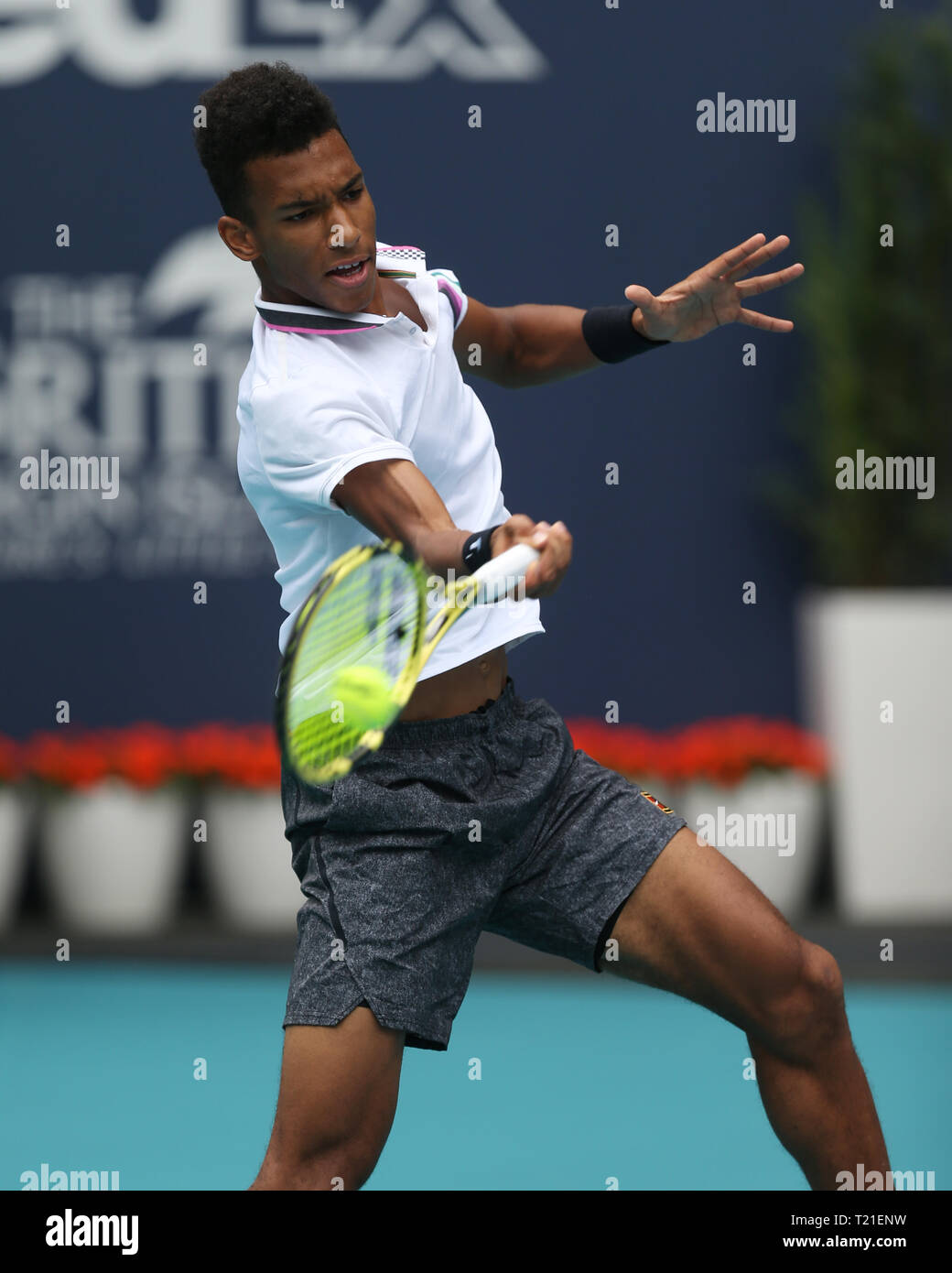 Miami Gardens, Florida, USA. 29. Mär 2019. John Isner von USA Niederlagen Felix Auger-Aliassime ...