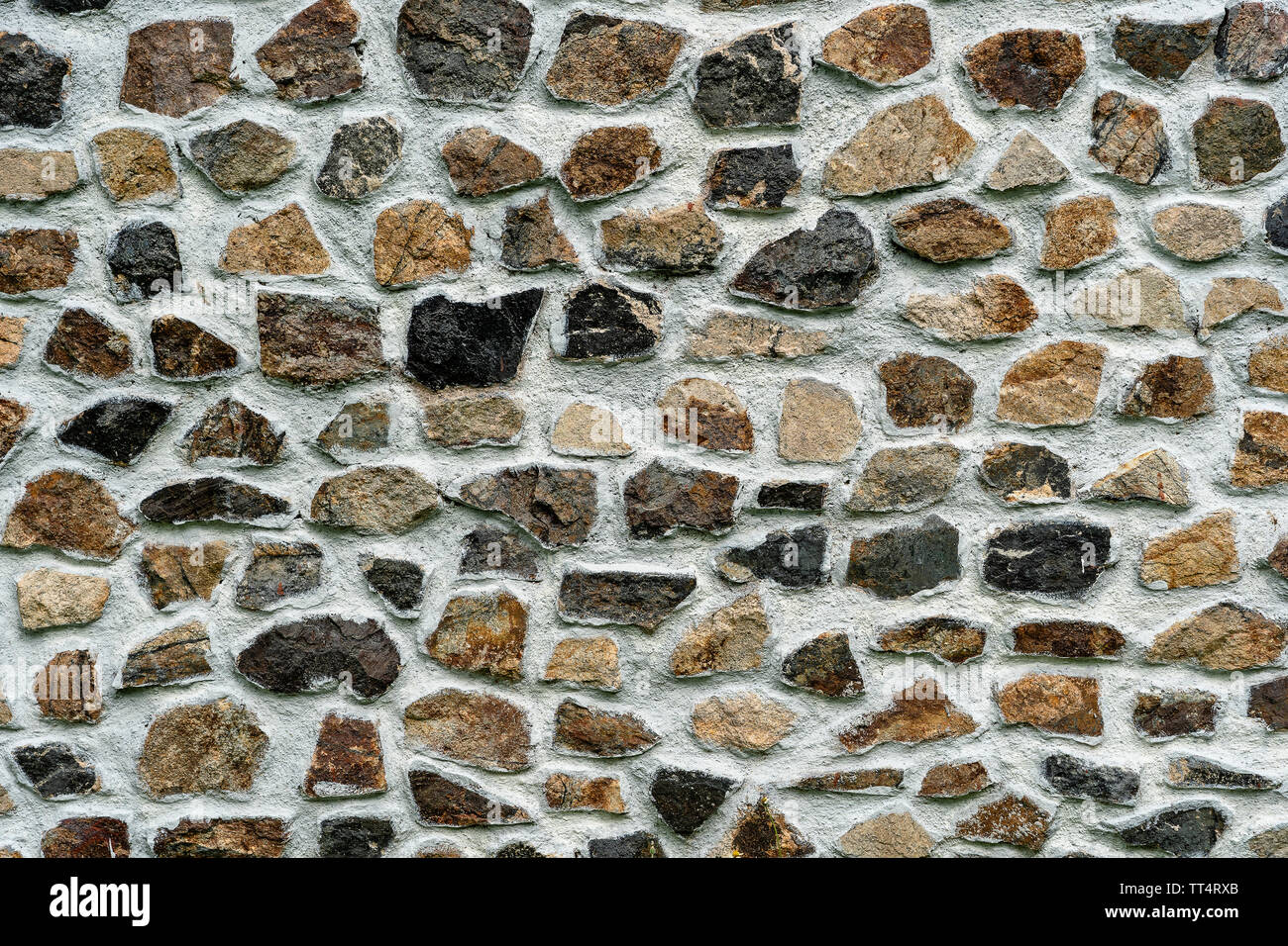 Hintergrund Textur der Mauer aus Stein, aus der Nähe. Natursteinfassade ...