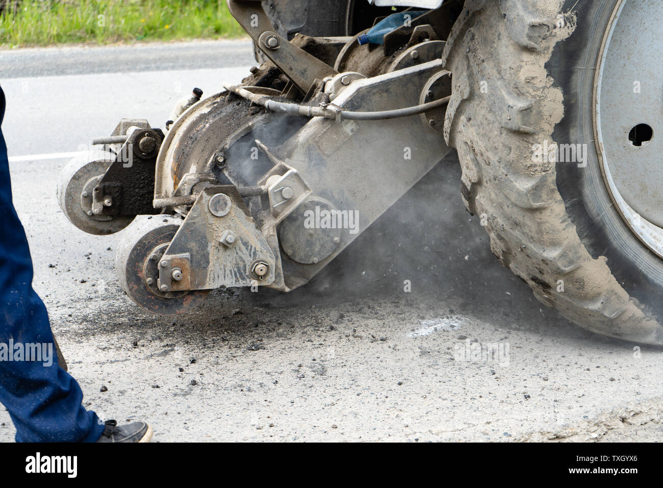 Asphalt cutter -Fotos und -Bildmaterial in hoher Auflösung – Alamy