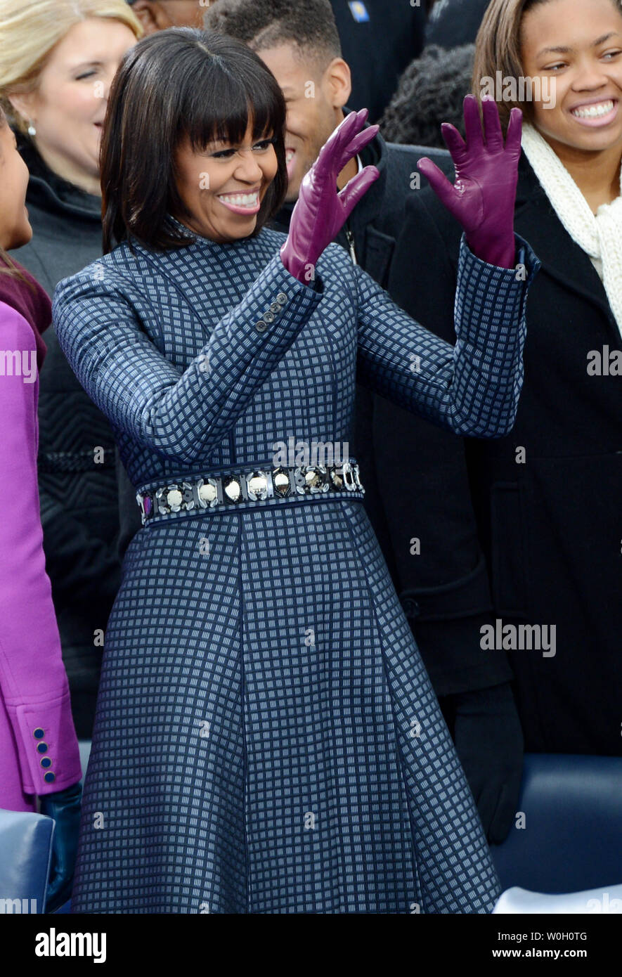 First Lady Michelle Obama nimmt ein Bild vor US-Präsident Barack Obama ...