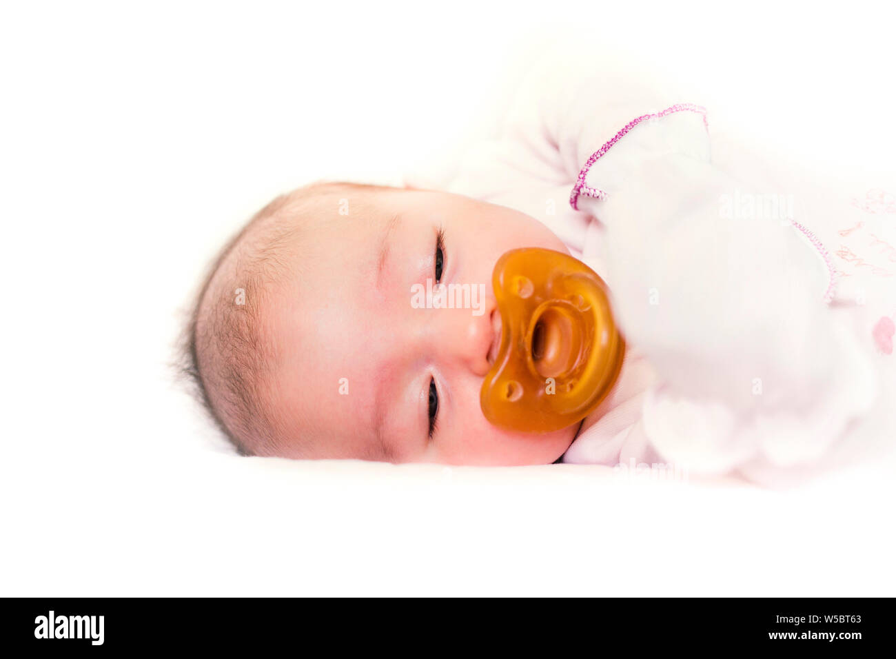 Close up baby pacifier in mouth -Fotos und -Bildmaterial in hoher ...