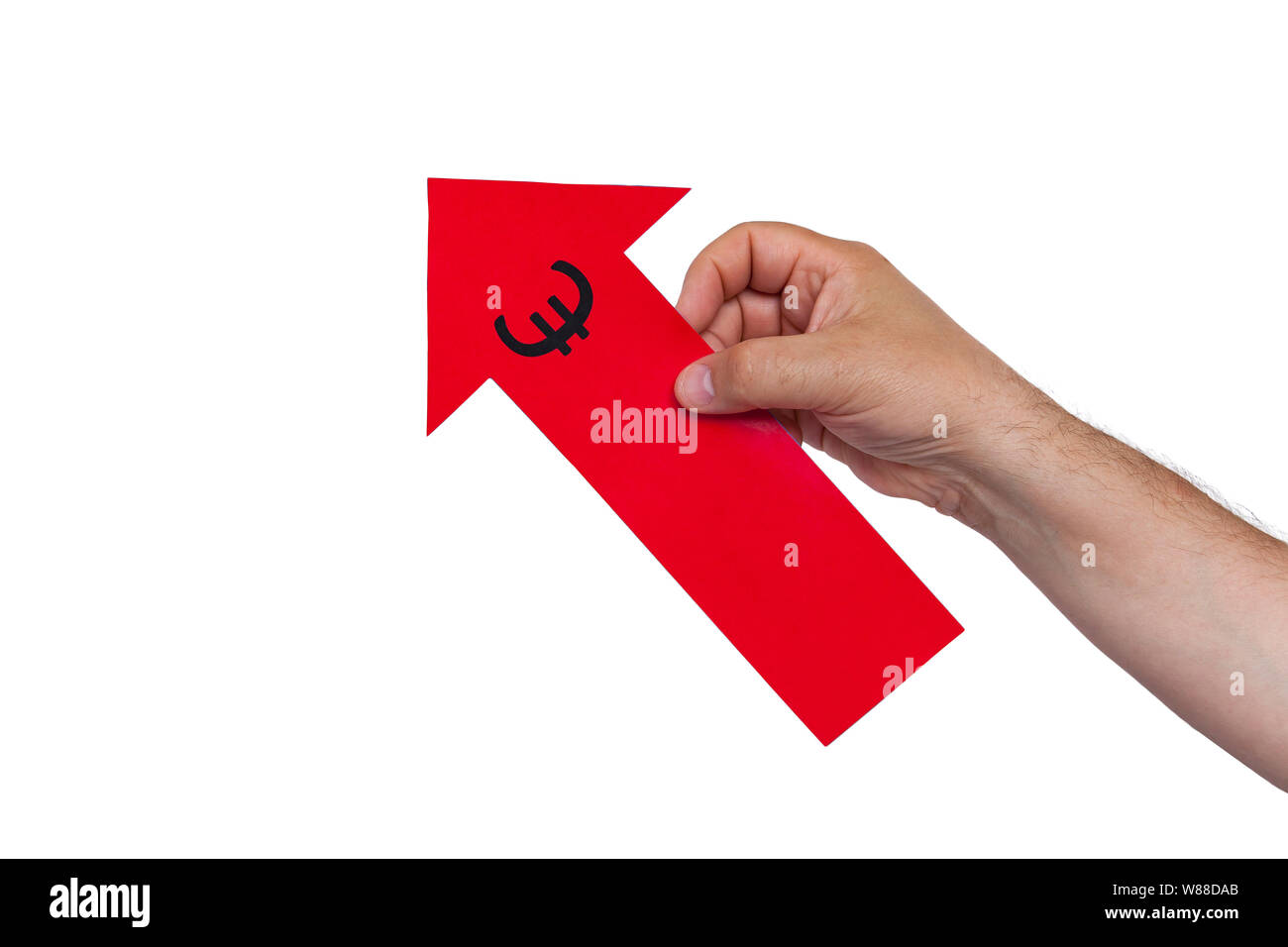 Die Hand hält den Pfeil, der sich zeigt. Der Pfeil hat ein Euro-Zeichen ...