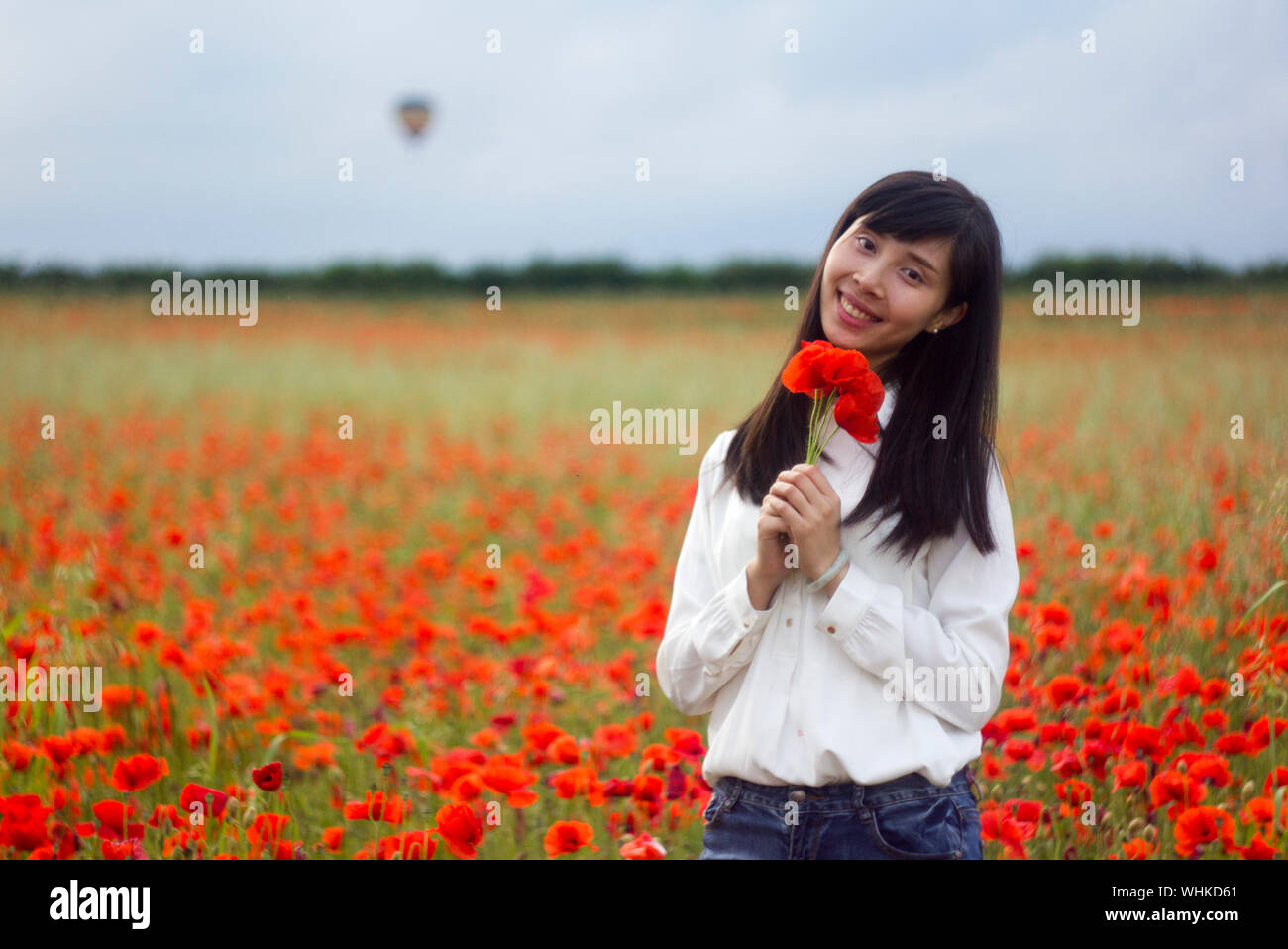 Frau Mohn Feld Stockfotos und -bilder Kaufen - Alamy