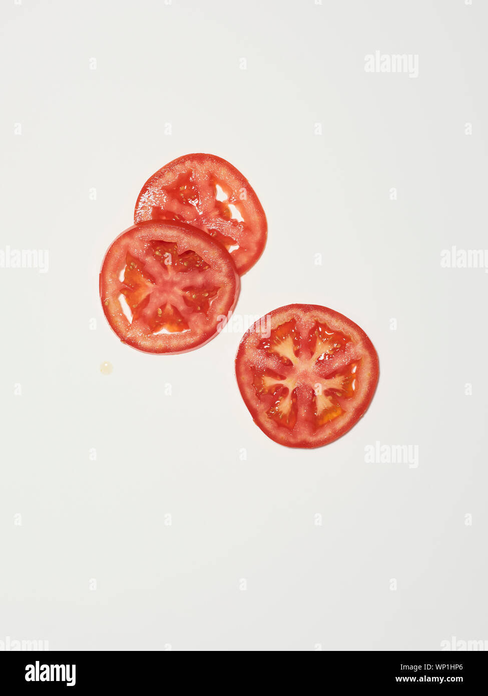 Drei scheiben tomaten -Fotos und -Bildmaterial in hoher Auflösung – Alamy