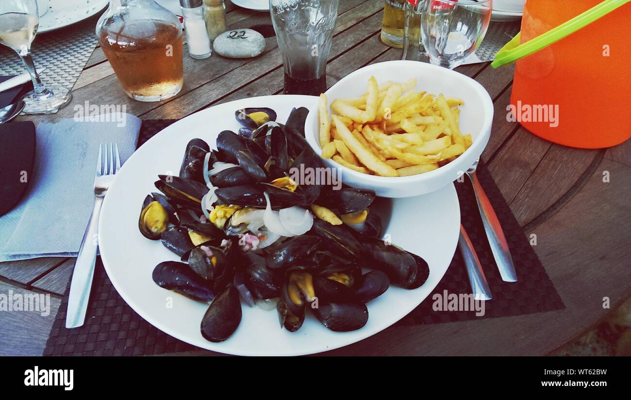 Muscheln mit pommes frites -Fotos und -Bildmaterial in hoher Auflösung ...