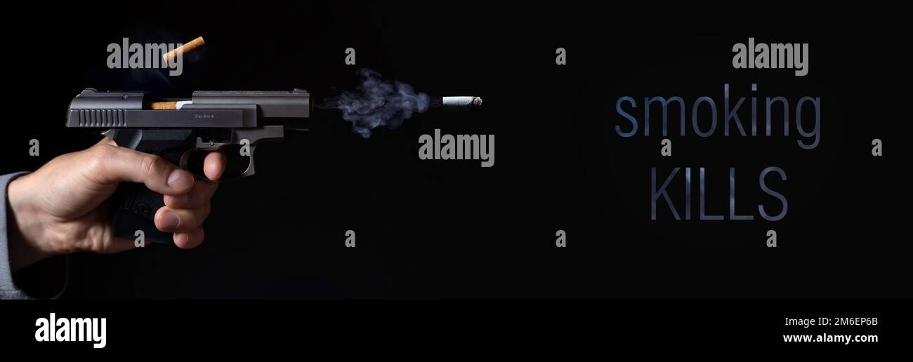 Concepto de daño al fumar, fumar mata, Una pistola disparando un ... Concepto de daño al fumar, fumar mata, Una pistola disparando un ...