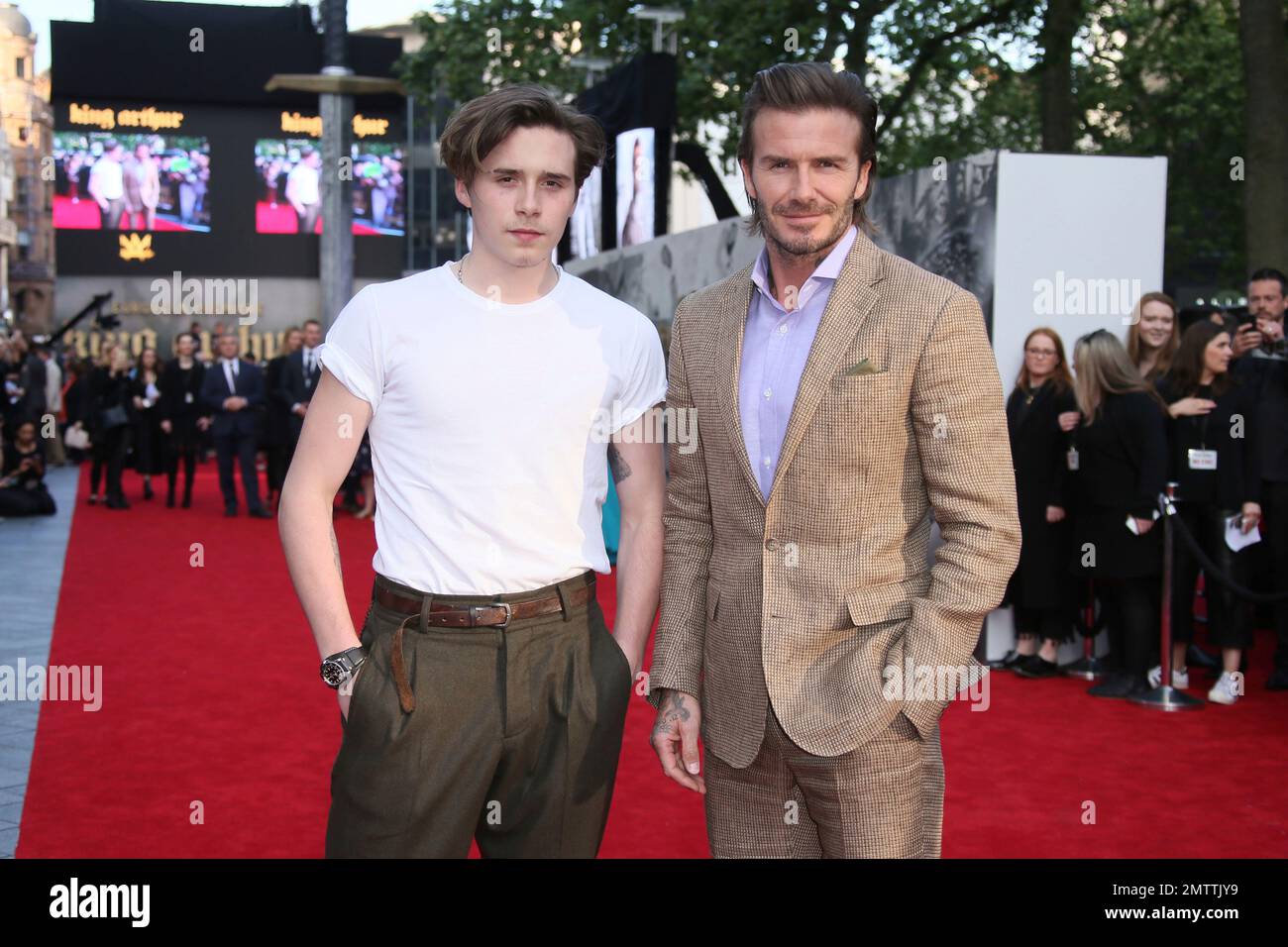 Actor David Beckham Right Poses With His Son Brooklyn Beckham For Photographers Upon Arrival
