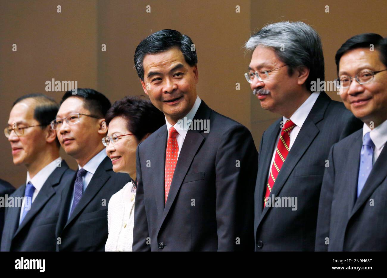 The members of Hong Kong's new cabinet, from left, Secretary for Home ...