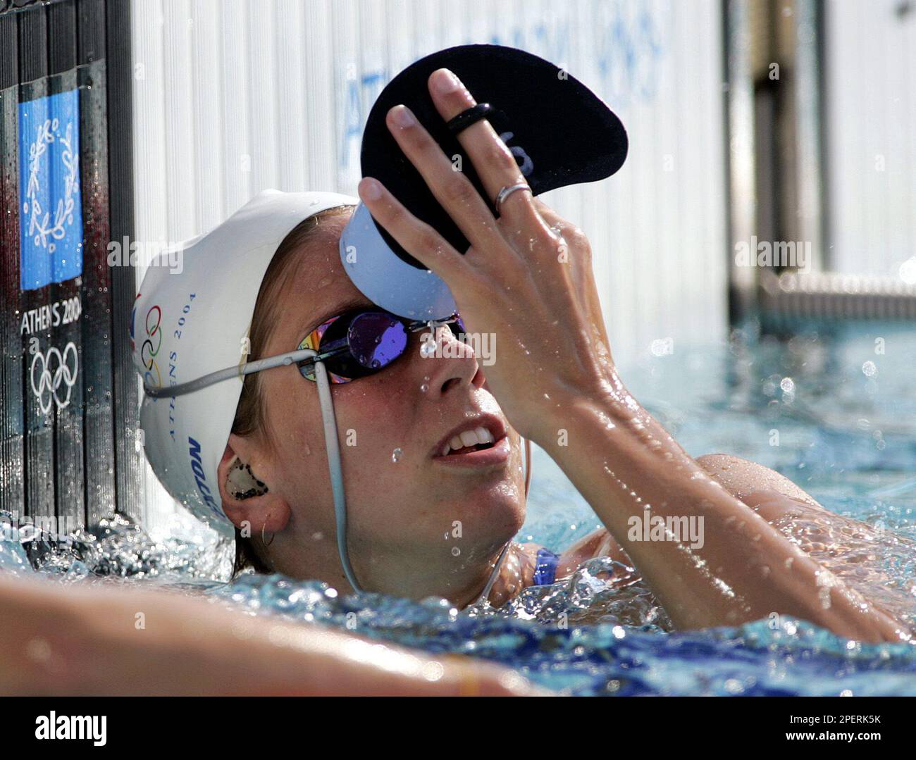Katy Sexton Of Great Britain Balances A Cup On Her Head As She Does