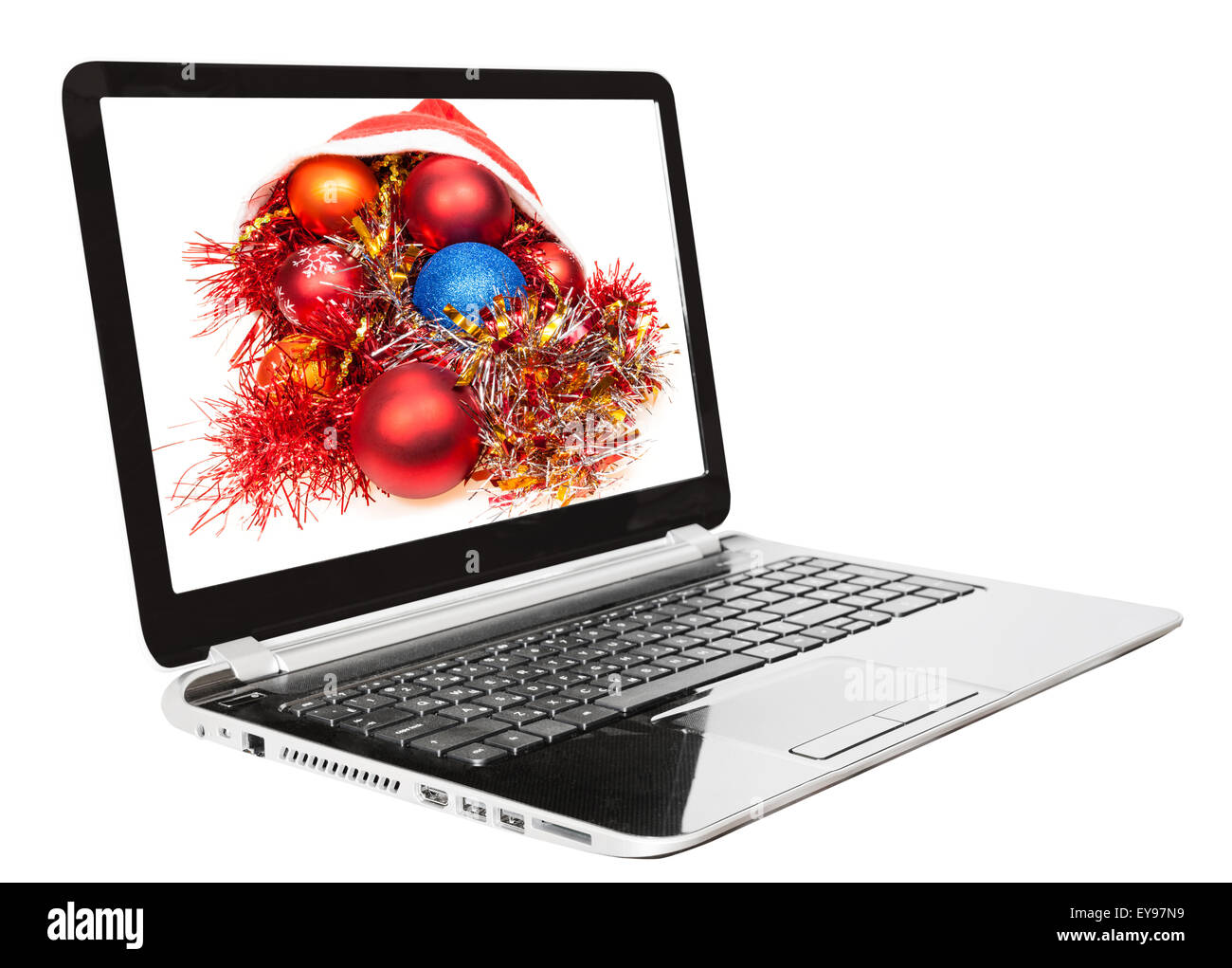 Navidad bodegón con bolas rojas y azules en la pantalla del portátil ...