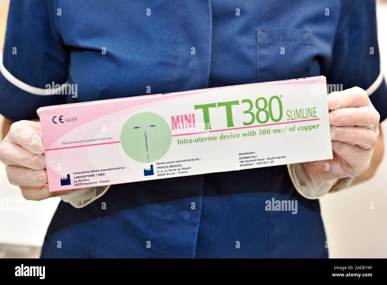 La bobine de la contraception. Nurse holding a Mini TT380 slimline ...