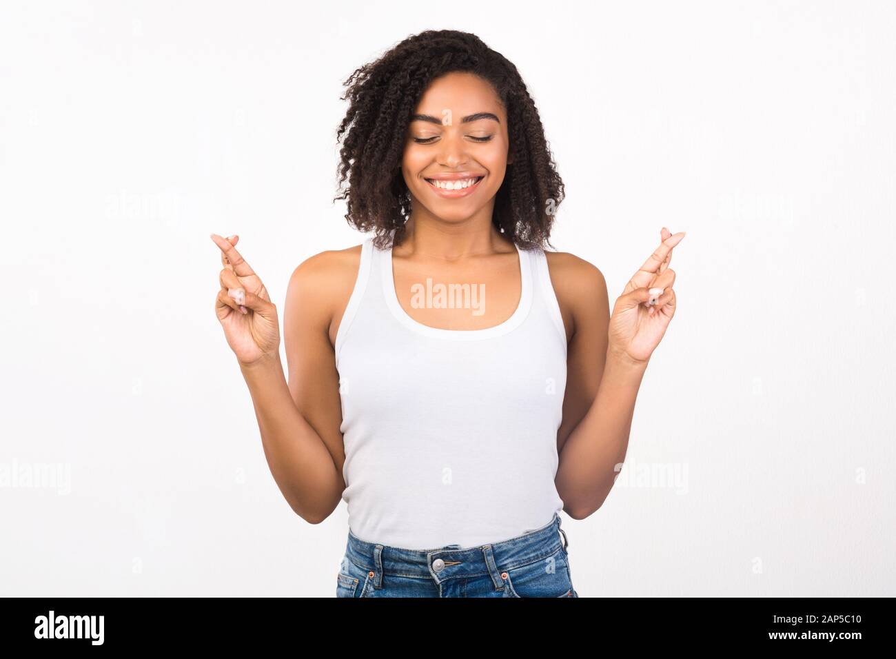Croiser les doigts souriants Banque de photographies et d’images à ...