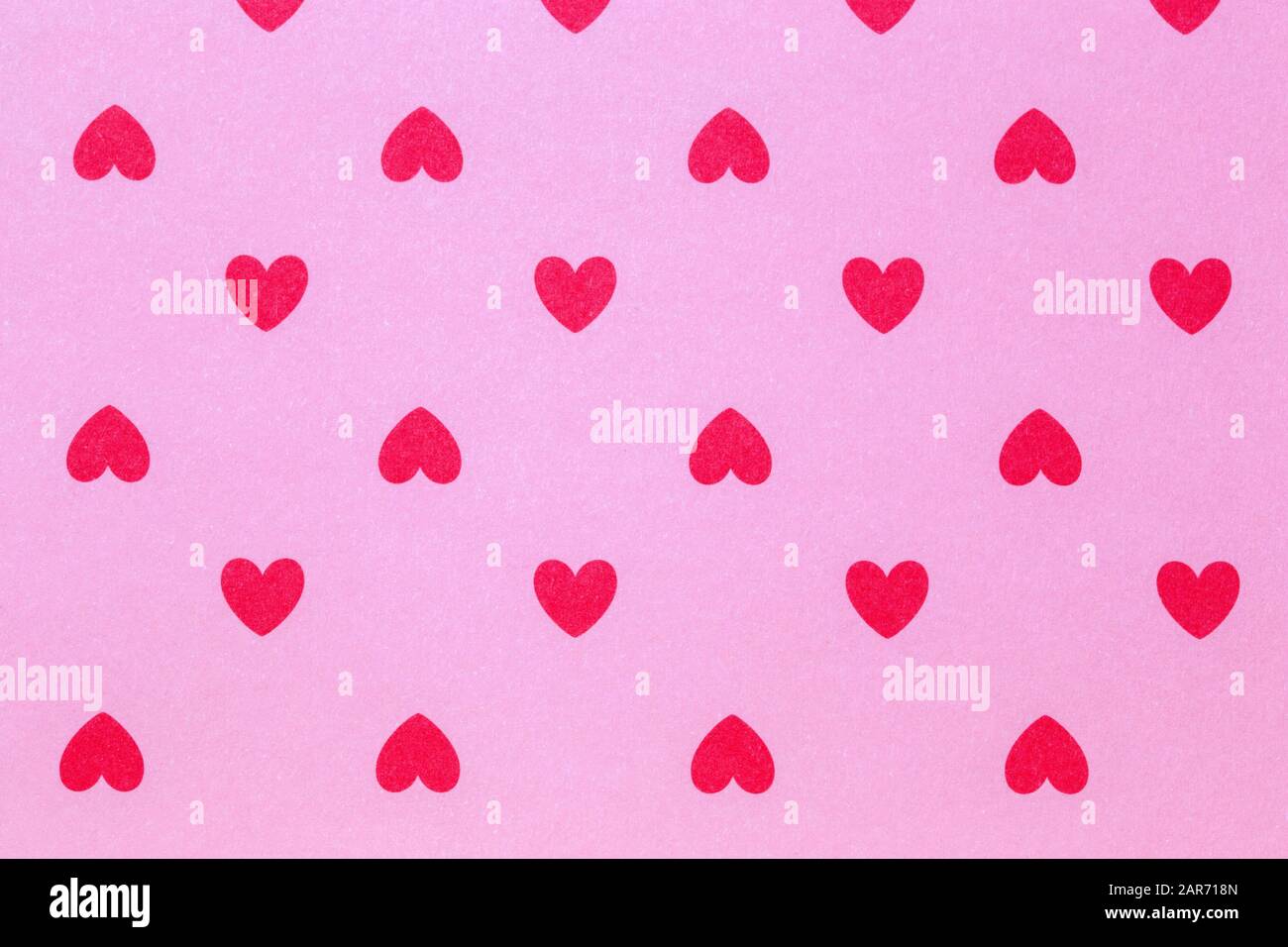 Petit coeur rose objet papier sur fond rose Saint-Valentin concept de Lover avec espace de copie ...