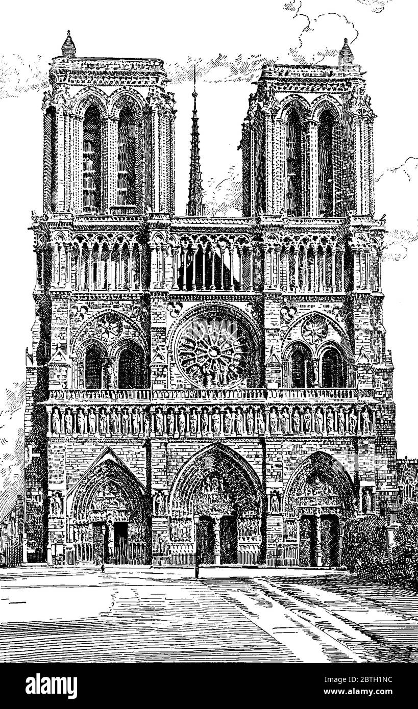Bâtiment avec deux tours carrées massives et une arche pointue sur une ...