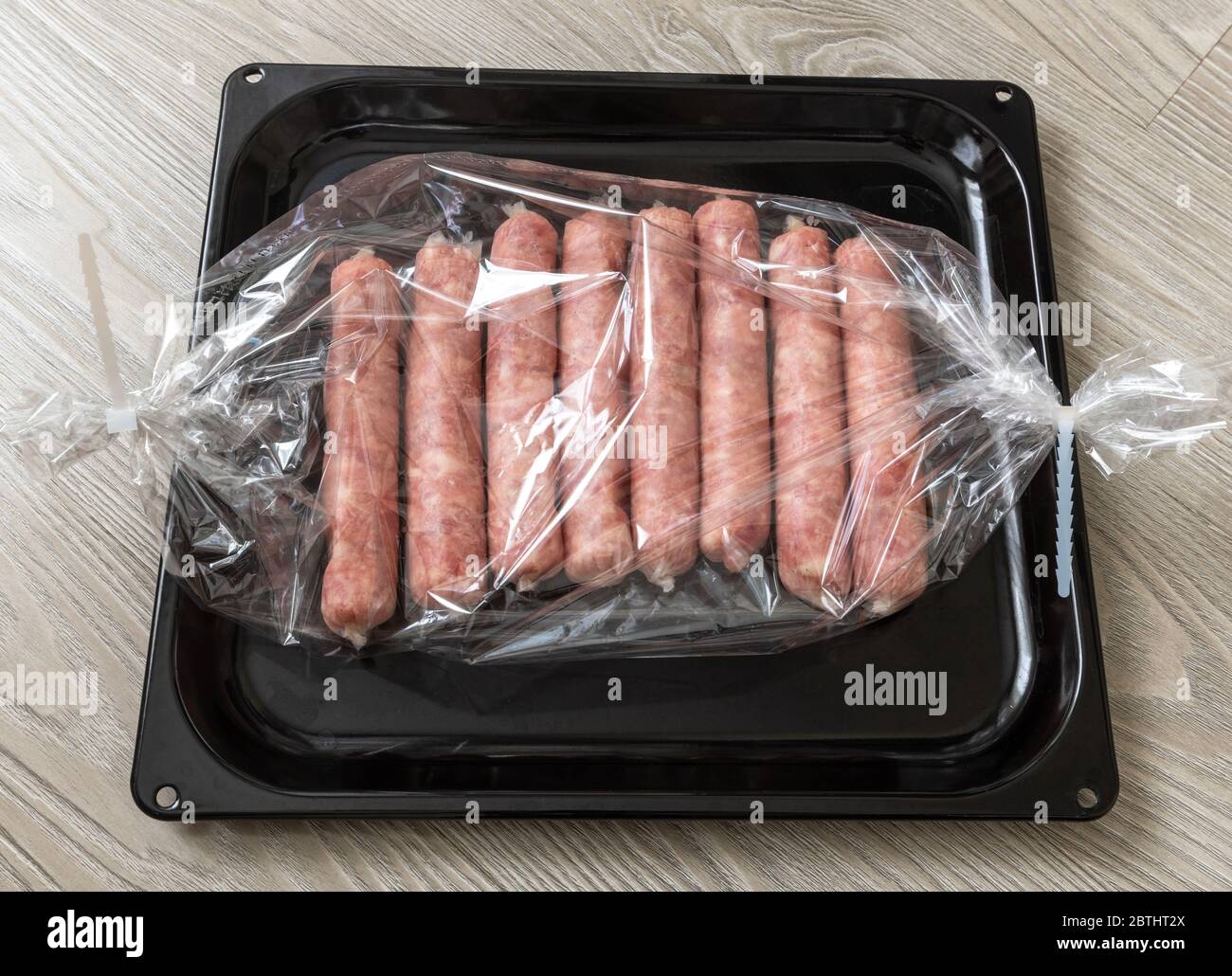 Saucisses de porc crues Banque de photographies et d’images à haute résolution - Alamy