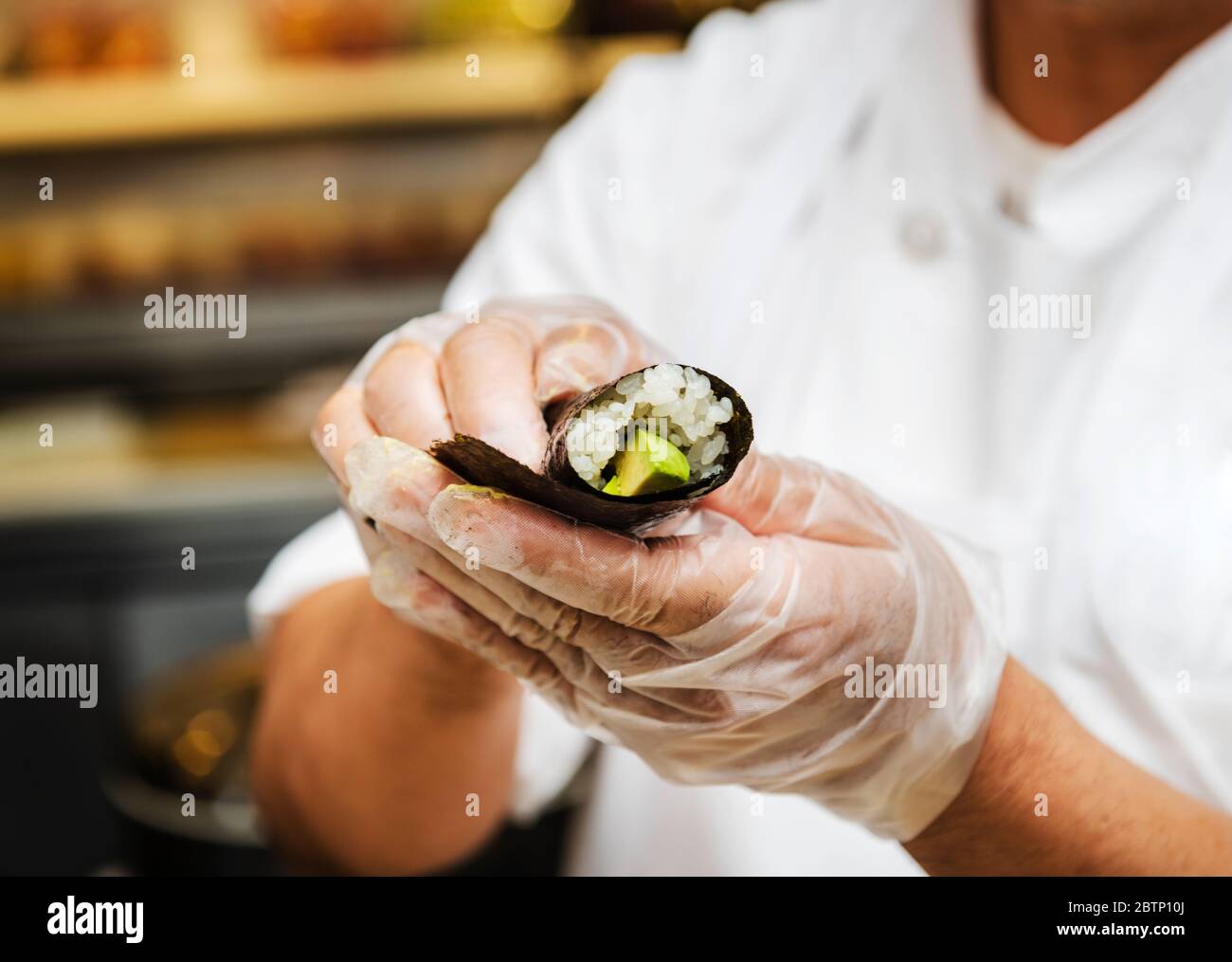 Main de sushi Banque de photographies et d’images à haute résolution ...