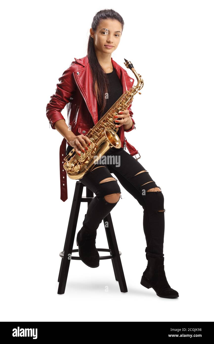 Jeune femme assise sur une chaise Banque de photographies et d’images à haute résolution - Alamy