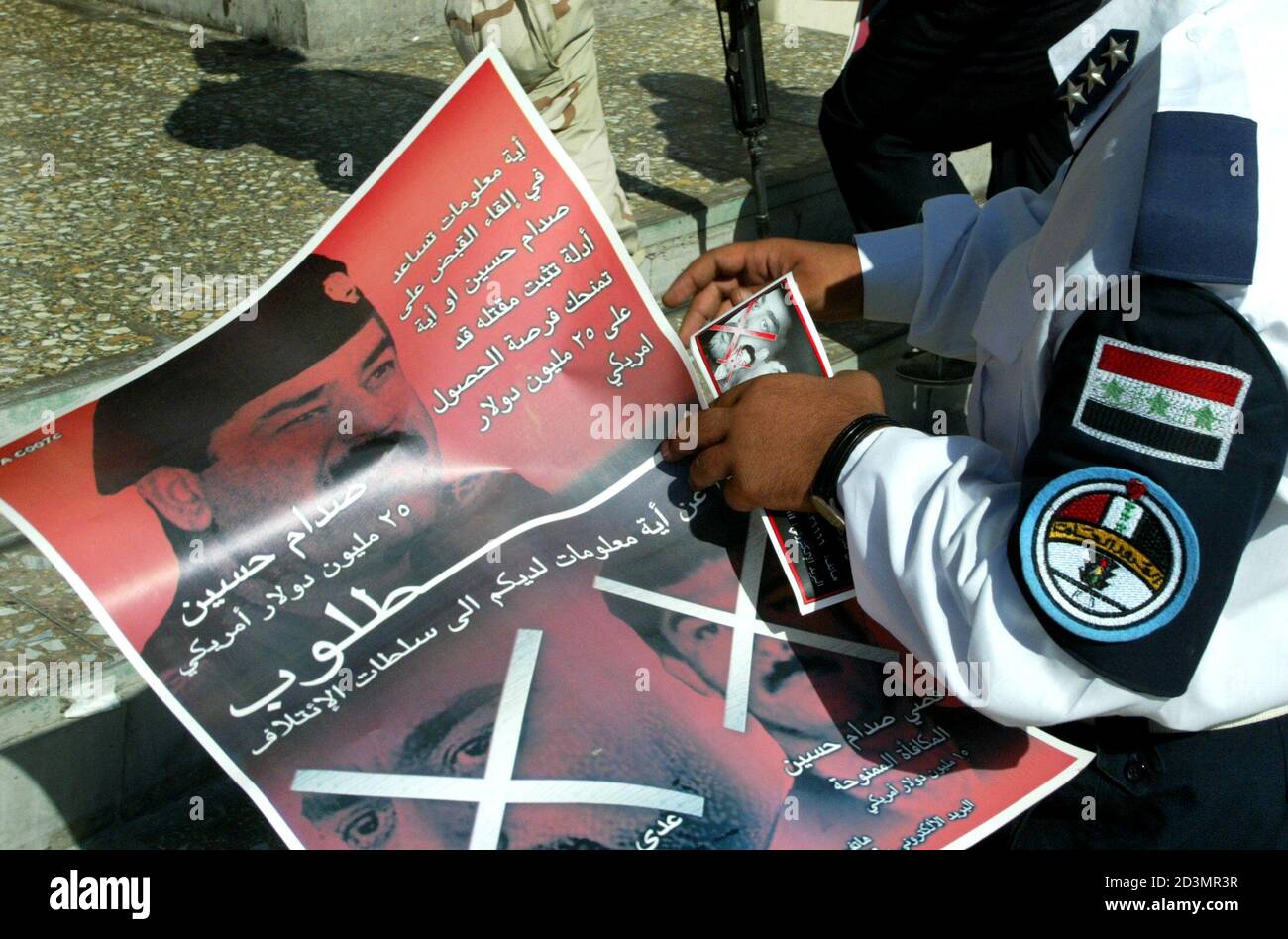 Posters of saddam hussein Banque de photographies et d’images à haute ...