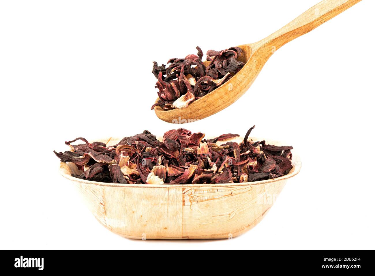 L'hibiscus séché ou le soudan a rose sur une cuillère en bois et bol ...