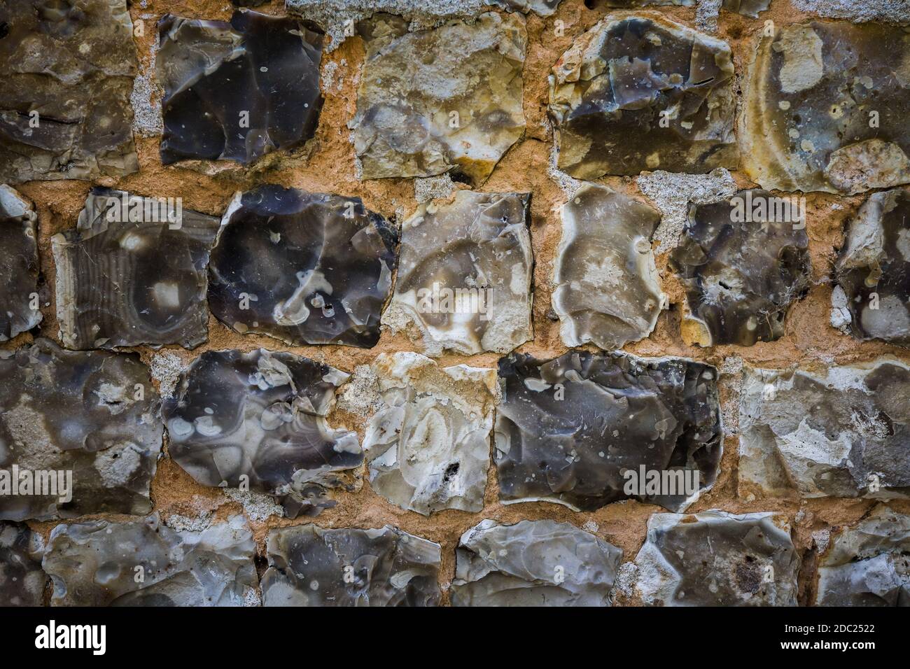 Mur de pierre, silex et béton. Arrière-plan, texture Photo Stock - Alamy